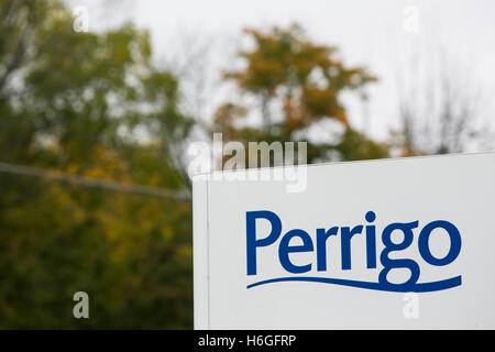 A logo sign outside of the headquarters of the Perrigo Company in ...