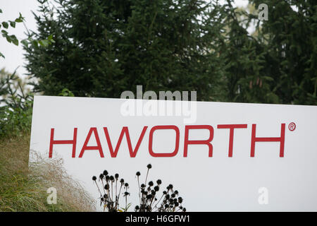 A logo sign outside of the headquarters of Haworth Inc., in Holland ...