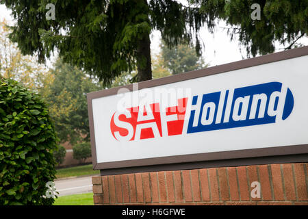 A logo sign outside of the headquarters of SAF-HOLLAND in Holland ...