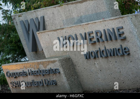 A logo sign outside of the headquarters of Wolverine Worldwide in ...