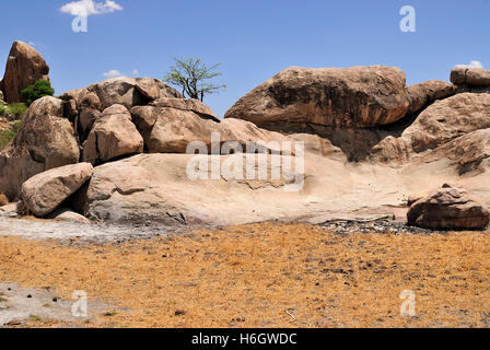 Rock formation around a lake near Nala, Central Tanzania Stock Photo ...