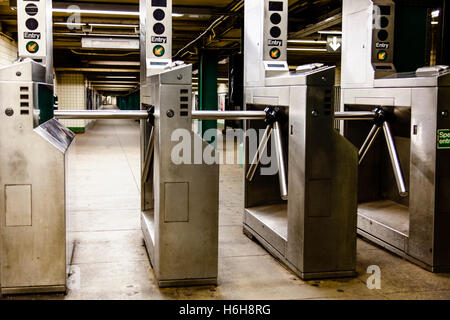 Turnstiles (baffle gates) in a New-York subway station Stock Photo - Alamy