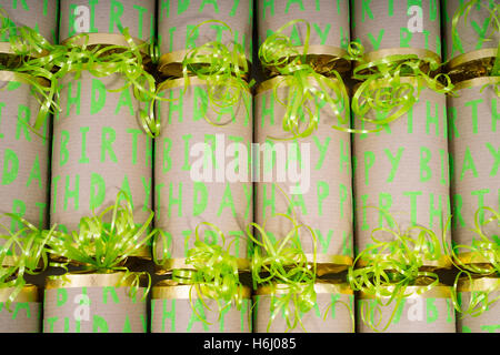 A studio shot of Happy Birthday Crackers Stock Photo - Alamy