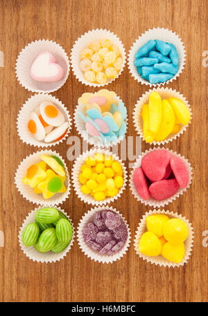 Many types of candies placed in small bowls by type and color Stock ...