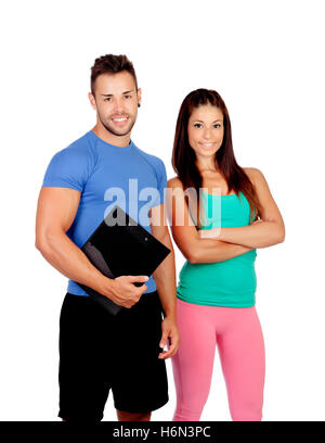 Handsome personal trainer with a attractive girl isolated on a white ...