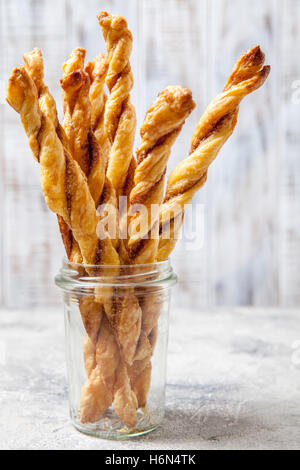 Cinnamon puff pastry sticks Stock Photo - Alamy