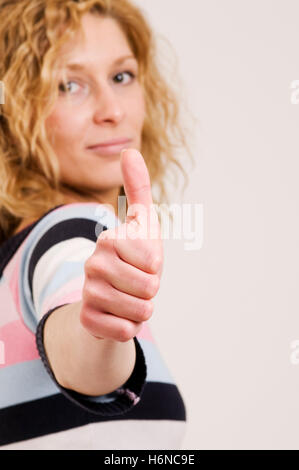 Thumbs high, Daumen hoch Stock Photo - Alamy