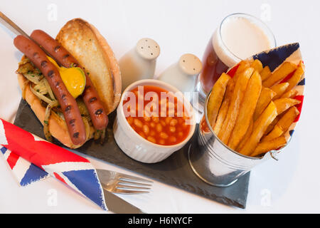 hot dogs served with baked beans on a plate Stock Photo - Alamy