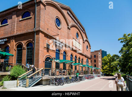 REI and Starbucks in old Denver Tramway Power Building Stock Photo - Alamy