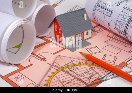 concept image - planning the construction of a house - architect's plan ...