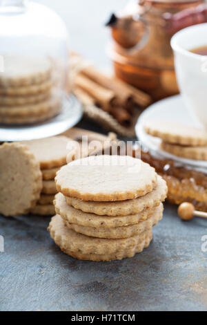 Christmas gingerbread cookies with sugar paste and natural fir tree and ...