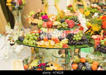 Fresh sliced fruit on a buffet table. Asian buffet restaurant Stock ...