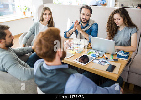 Creative business people brainstorming Stock Photo - Alamy