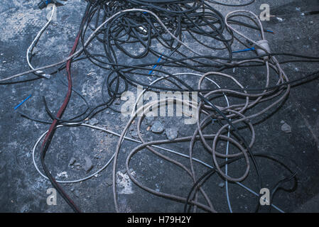 Electric cables mess Stock Photo - Alamy