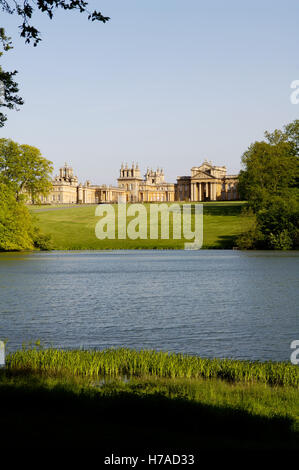 Baroque facade of Blenheim Palace viewed across river Glyme ...
