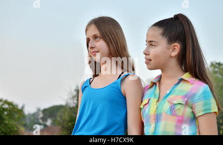 Best Friends Forever - two 12 year old teenage girls holding hands at ...