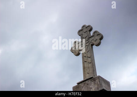 Photograph of a stone crucifix statue Stock Photo - Alamy
