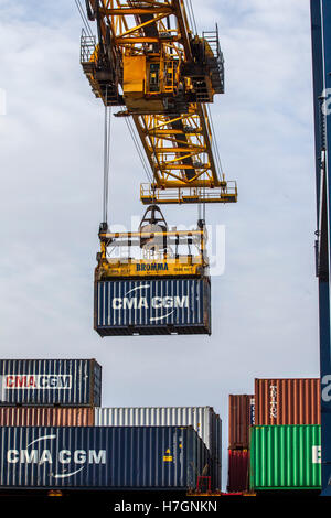 shipping container being unloaded from rail car Stock Photo - Alamy