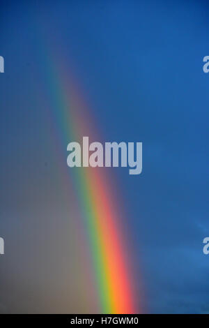 A rainbow appears following heavy rain at the Old Royal Naval College ...