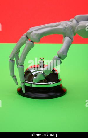 Customer hand ringing service bell at coffee cafe shop for calling the ...