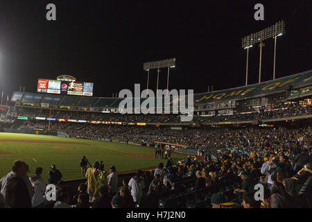 Fans watch during the fourth inning of a spring training baseball game ...