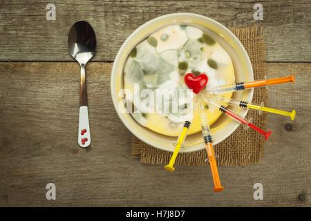 Moldy pudding. Poisonous food full of mold. Unhealthy food. Spores of ...
