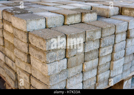Stack of small rectangular concrete pavers Stock Photo - Alamy