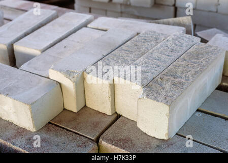 Stack of small rectangular concrete pavers Stock Photo - Alamy