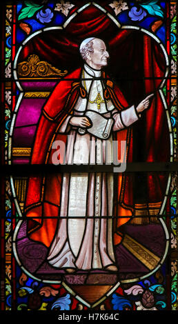 Stained Glass window depicting Cardinal Mercier (1851 - 1926), writing ...