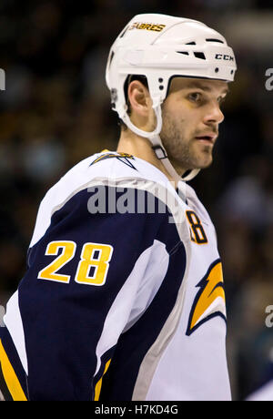 Buffalo Sabres' Paul Gaustad (28) hits Calgary Flames' Alex Tanguay (40 ...