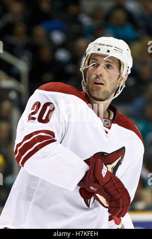 Phoenix Coyotes' Eric Belanger against the Calgary Flames in an NHL ...