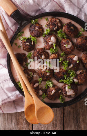 Hot meatballs with cranberry sauce on white plate Stock Photo - Alamy