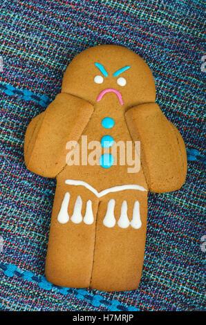 Scared gingerbread man cookie on a table Stock Photo - Alamy