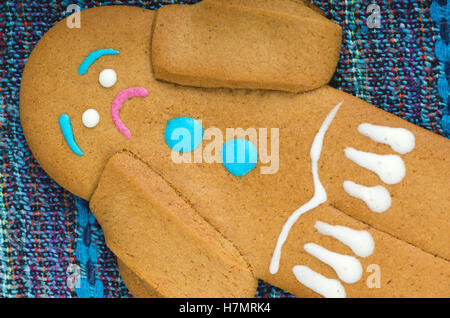 Sad gingerbread man cookie on a bridge Stock Photo - Alamy