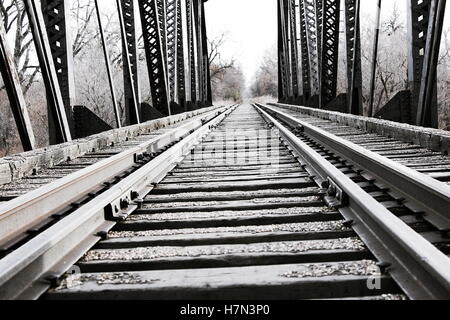 Steel beams on a railway bridge with steel plates and riveted ...