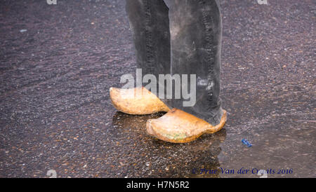clogs on feet in rain Stock Photo - Alamy