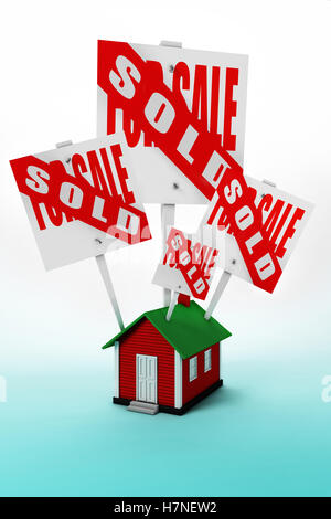 toy house with for sale signs Stock Photo - Alamy