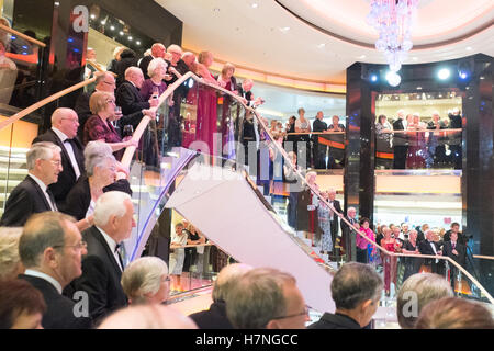 P&O Cruise ship Azura Atrium. The atrium has 2 glass elevators which go ...