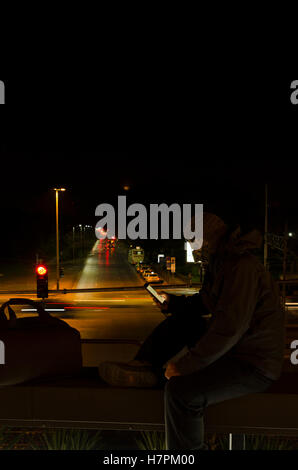 Long exposure night shot of the Kamikaze ride at the carnival midway ...