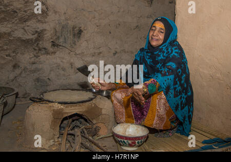 Nizwa, Oman, November 3rd, 2016: Omaniya making traditional bread Stock ...