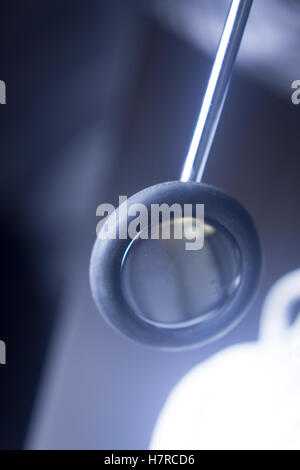 Doctor's reflex hammer tool used to test patient reflexes in knee and ...