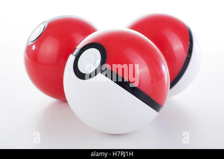 Pokemon ball pokeball on white studio background. Red and white poke ...