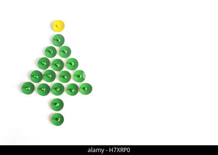 Green push pins. Thumbtacks christmas tree shape isolated on white ...