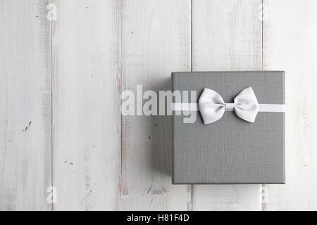 gray rectangular wooden gift box for jewelry storage, simple object ...