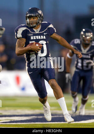 Nevada quarterback Colin Kaepernick (10) leap across the goal line to ...