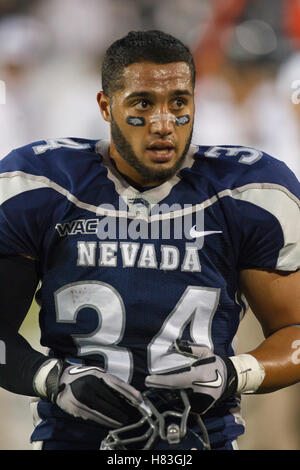 Nevada Wolf Pack running back Sean Dollars (4) makes a move with the ...