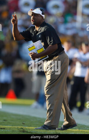 Colorado head coach Jon Embree paces the sidelines during an NCAA ...