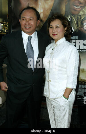 Director John Woo with wife Annie Woo and daughter Angeles Woo arriving ...