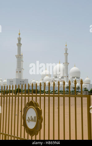 Gate and domes of White Grand Mosque built with white marble stone ...