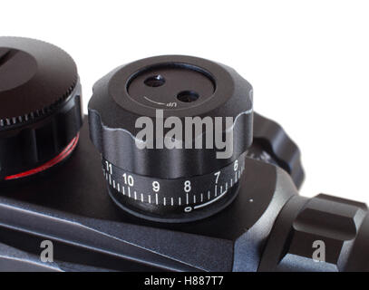 Adjustment dial for elevation on a rifle scope on a white background ...